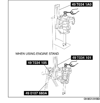 FRONT SHOCK ABSORBER AND COIL SPRING REMOVAL/INSTALLATION